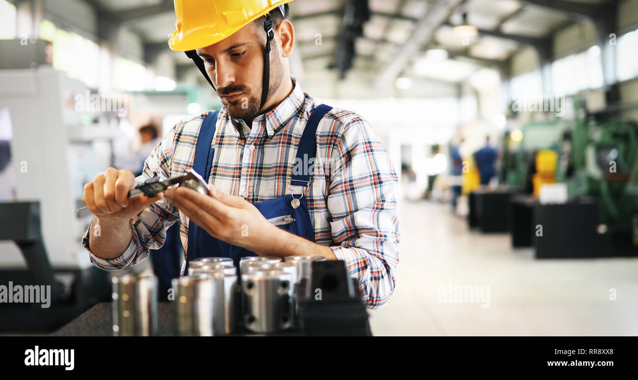 industrial factory employee working in metal manufacturing industry ...