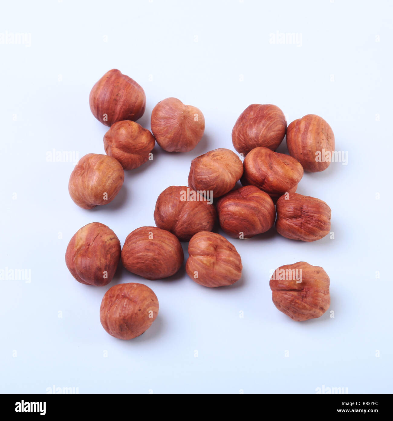 Half peeled hazelnuts isolated hi-res stock photography and images - Alamy