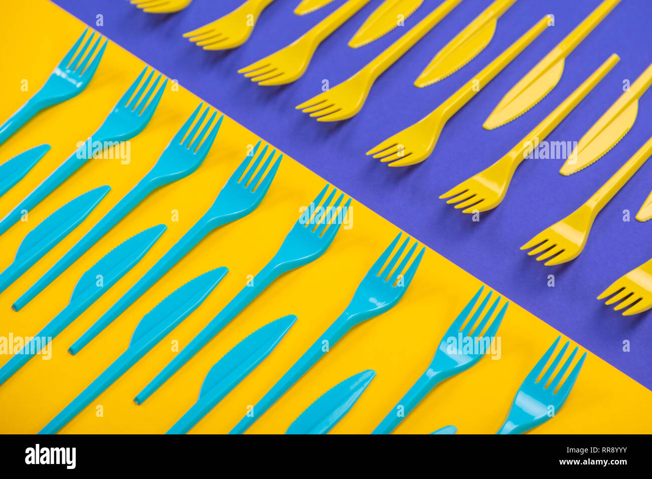 Colorful set of plastic table ware isolated on background Stock Photo ...