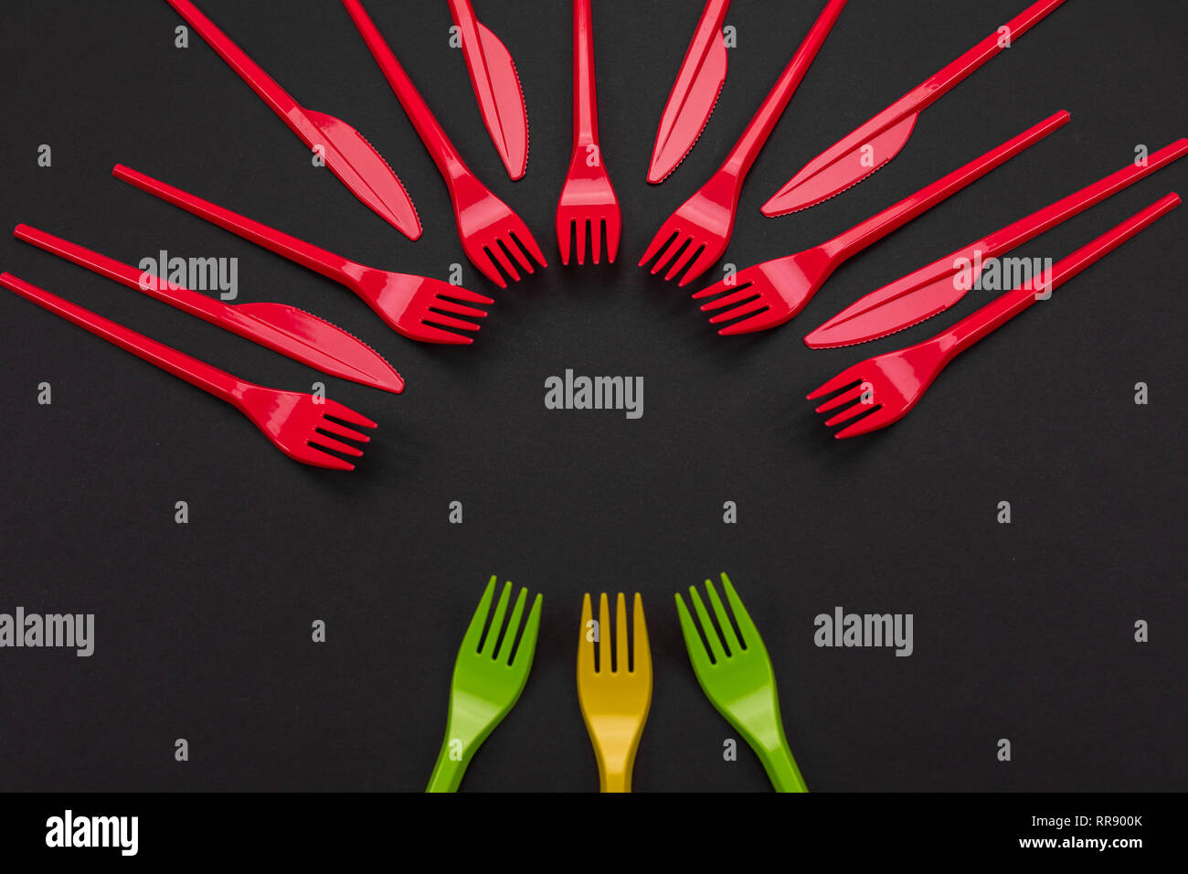 Colorful set of vibrant forks and knife isolated on black Stock Photo ...