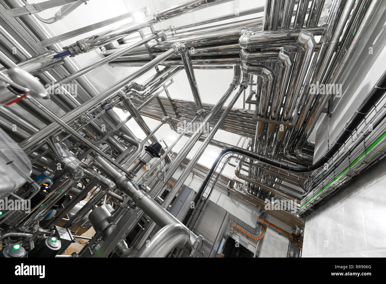Steel water pipeline, chrome pipes, pipe lines in plant workshop ...