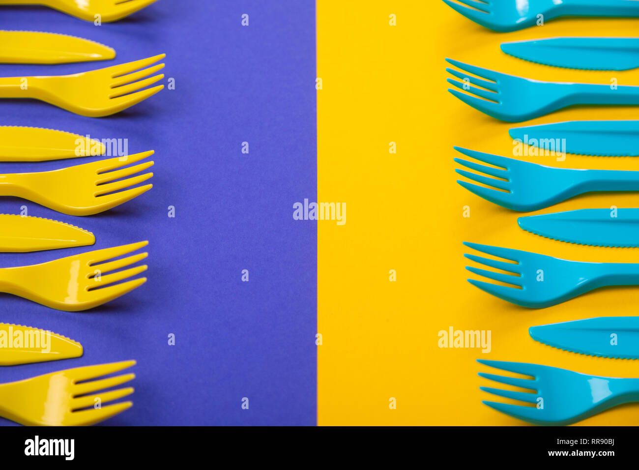 Colorful set of plastic table ware isolated on background Stock Photo ...