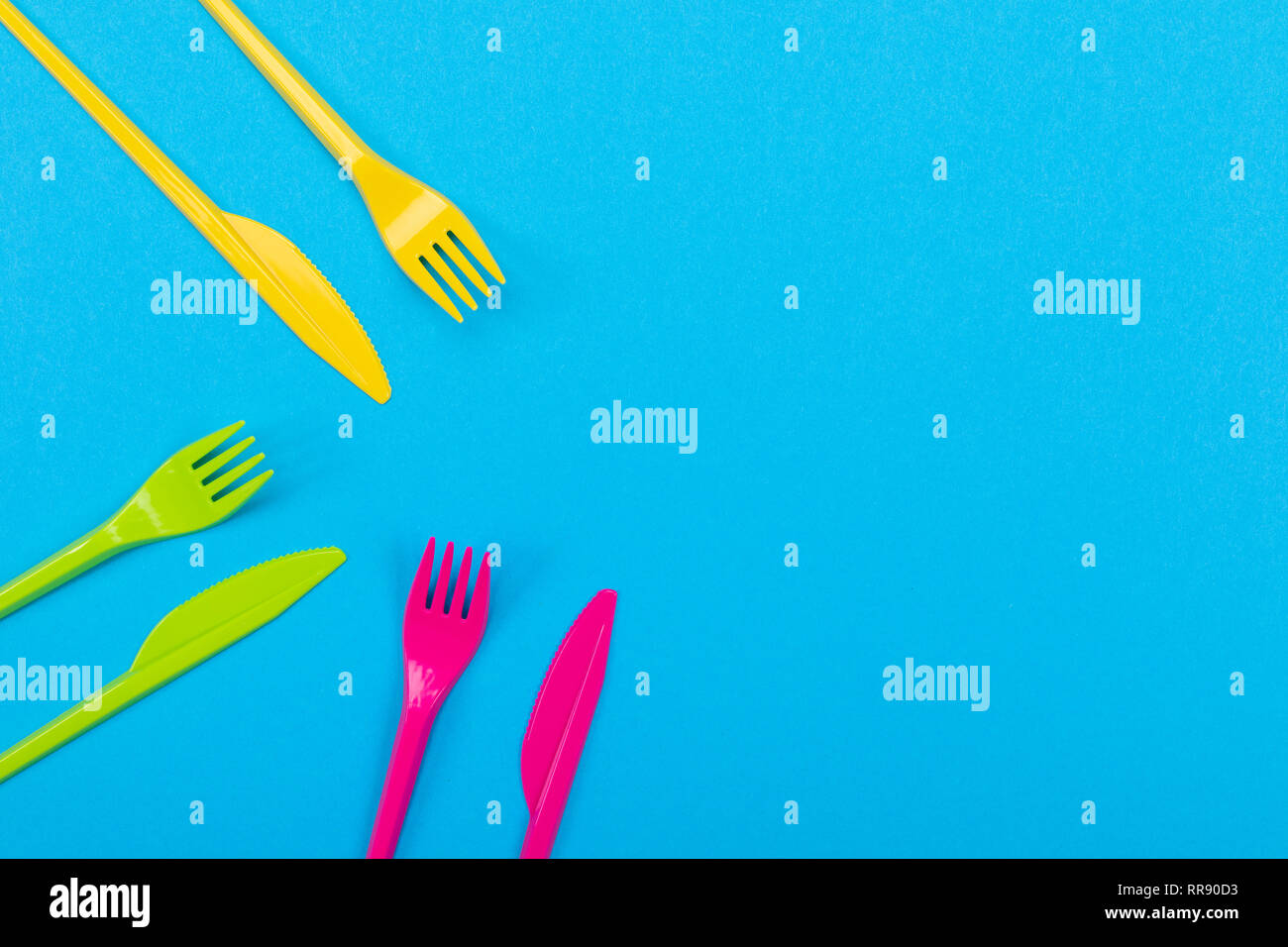 Colorful set of vibrant forks and knife isolated on black Stock Photo ...