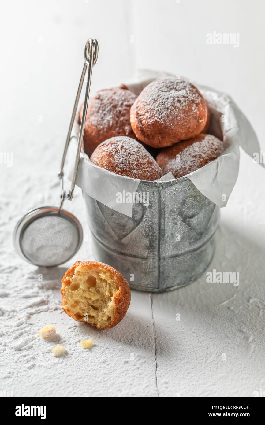 Tasty and homemade mini doughnuts with powdered sugar Stock Photo - Alamy