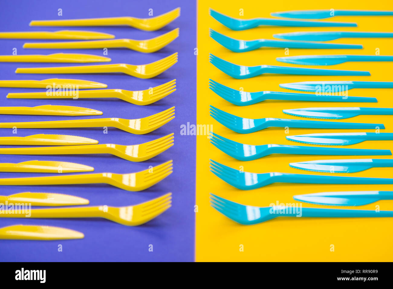 Colorful set of plastic table ware isolated on background Stock Photo ...