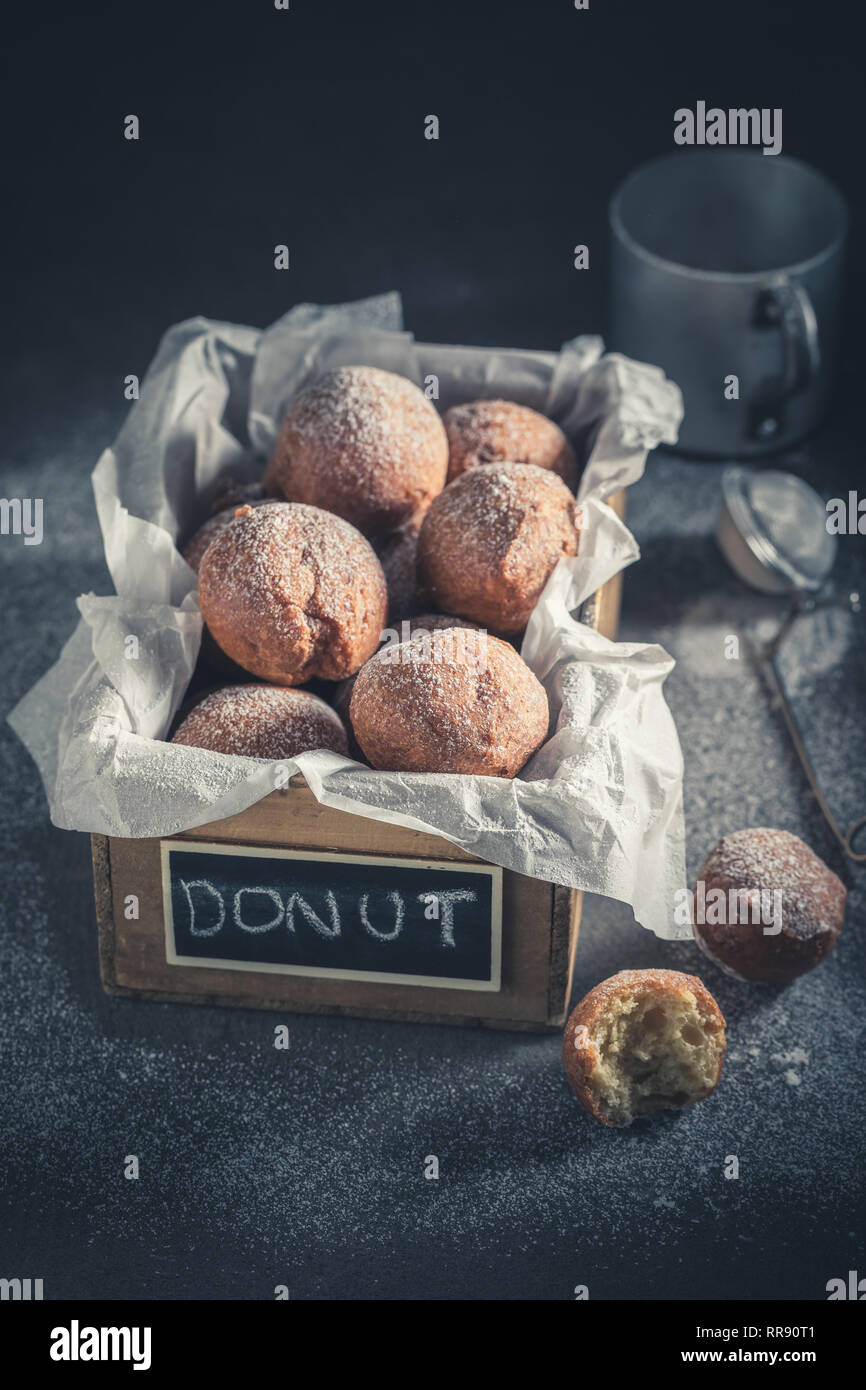 Yummy and fresh mini doughnuts hot and freshly baked Stock Photo - Alamy