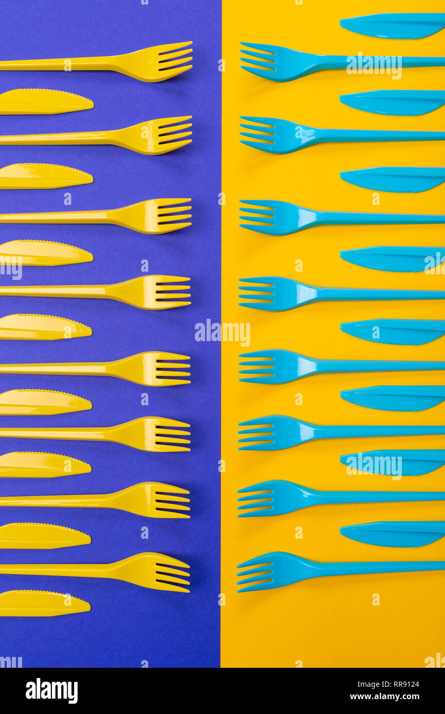 Colorful set of plastic table ware isolated on background Stock Photo ...