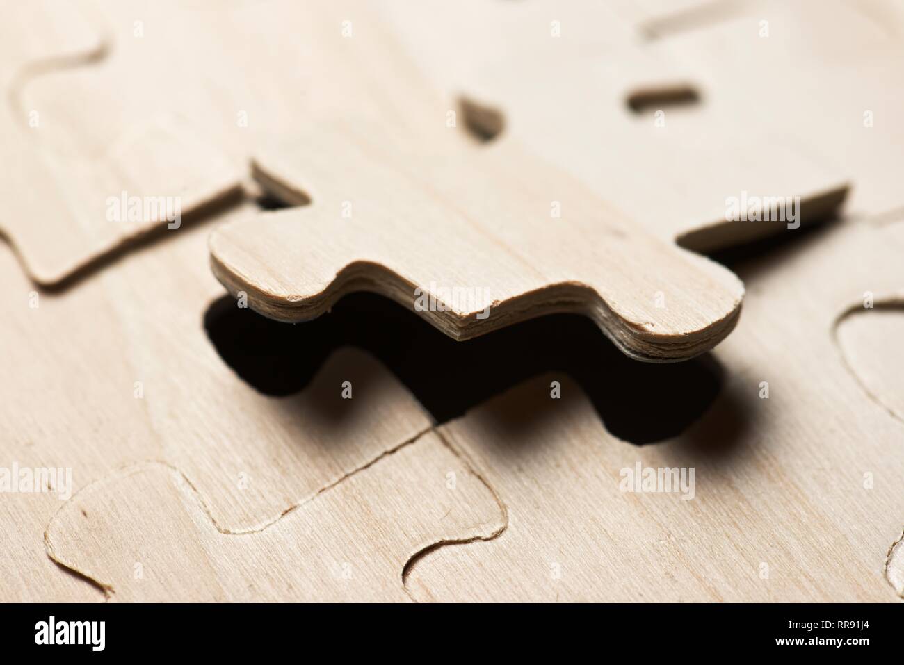 Close up of the pieces of a puzzle Stock Photo - Alamy