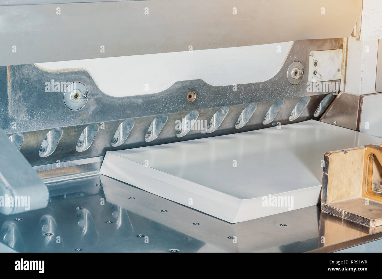 Large electronic knife for cutting paper in the printing Stock Photo ...