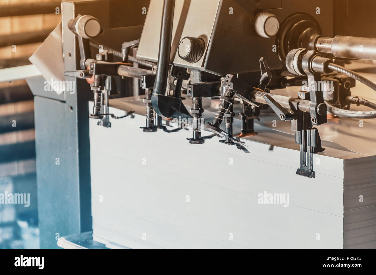 Feeding paper sheets hi-res stock photography and images - Alamy