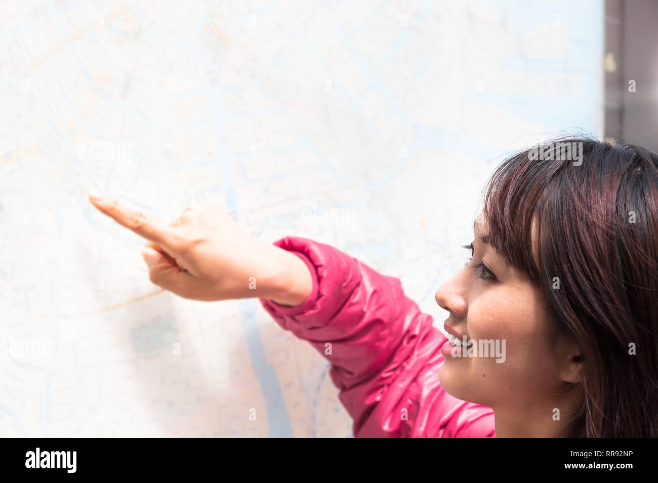 Finger pointing at map hi-res stock photography and images - Alamy