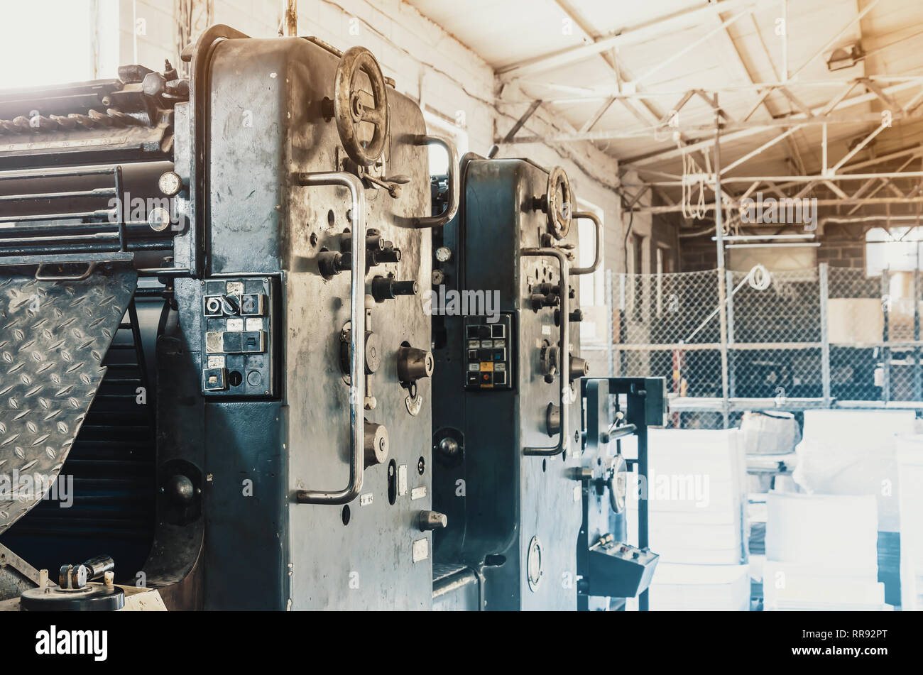 Old vintage printing machine in print shop. Magazine, newspaper ...