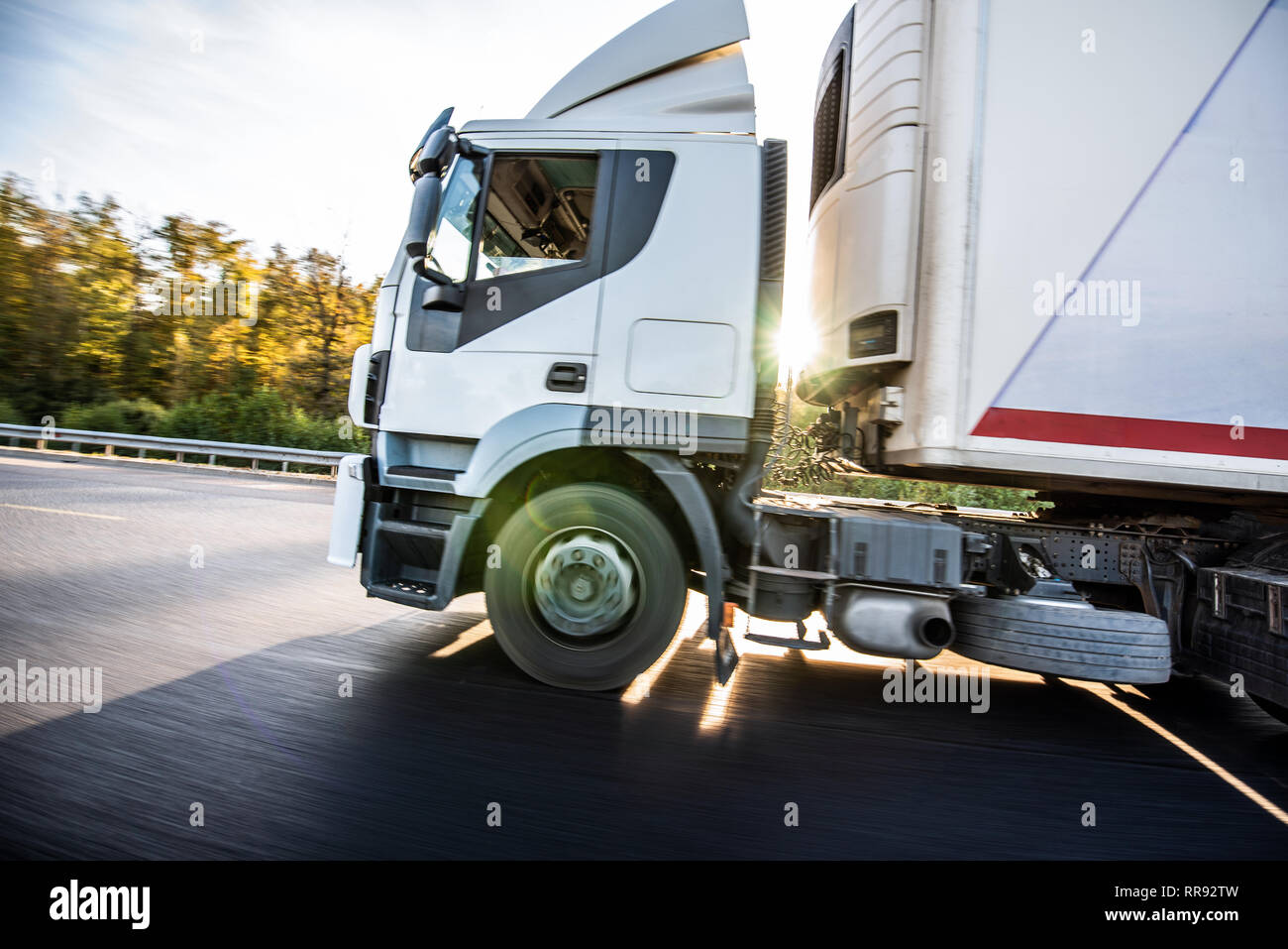 Delivery truck on highway with speed effect Stock Photo - Alamy