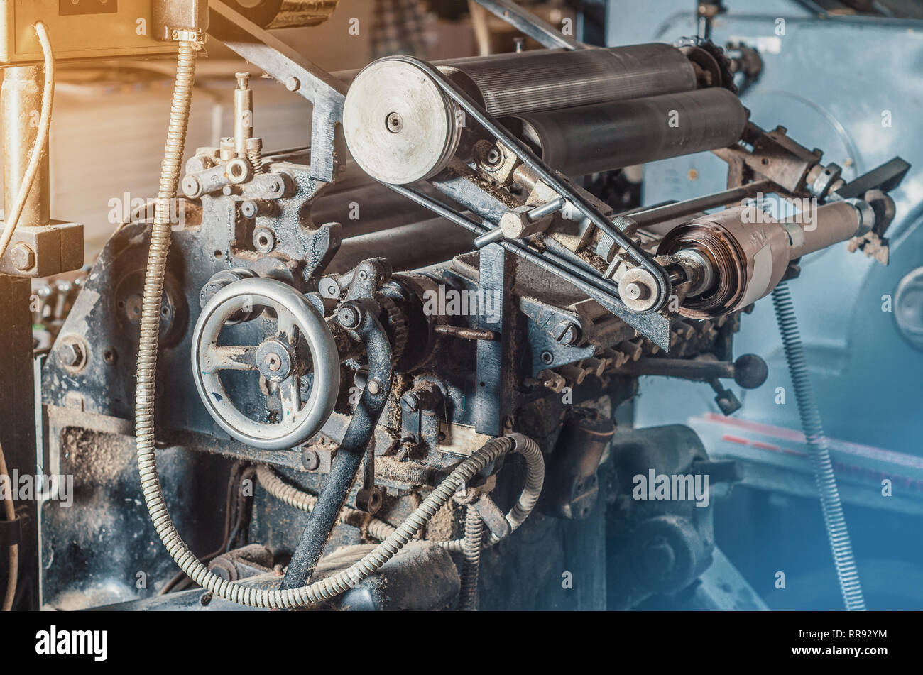 Vintage printing machine for carving in printing. Part of old mechanism ...