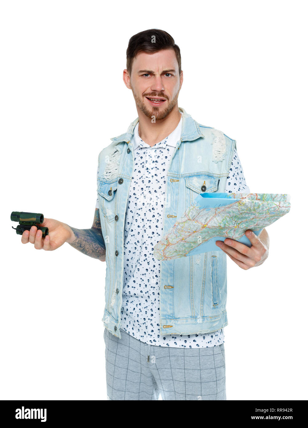 man with a map. Front view. The tourist in the denim jacket is angry or ...