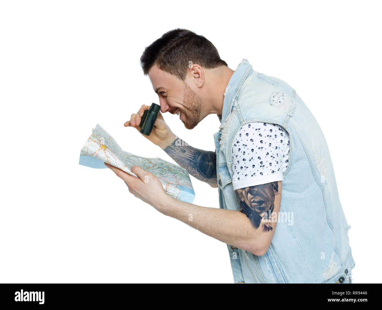 man with a map. Side view. Isolated on white background. A smiling ...