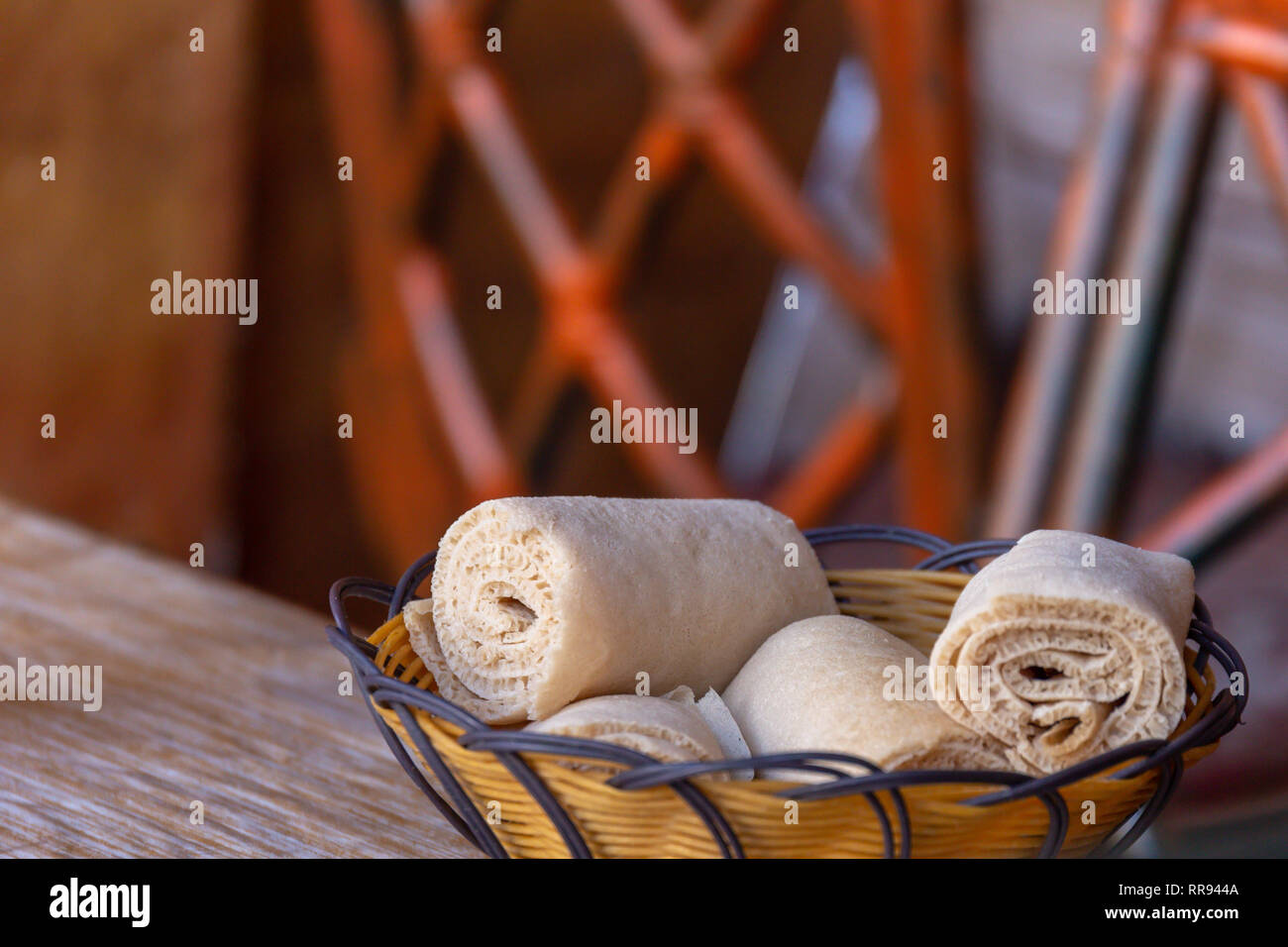 African food. Rolls of Injera - a sourdough flatbread made from teff ...