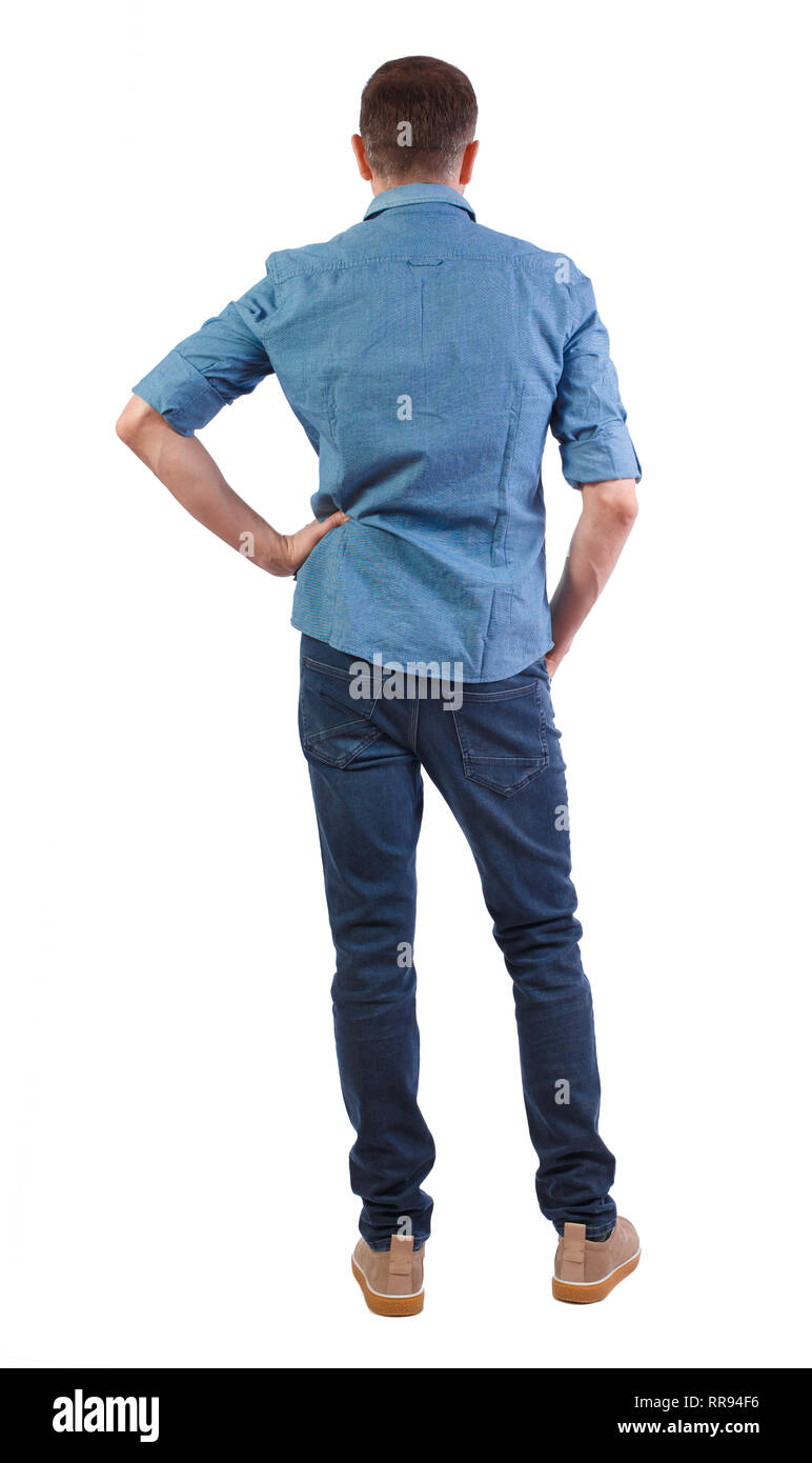 Back view of man in dark jeans. Standing young guy. Rear view people ...