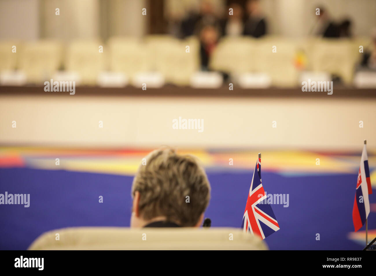 Details with the flag of the United Kingdom during a conference of ...