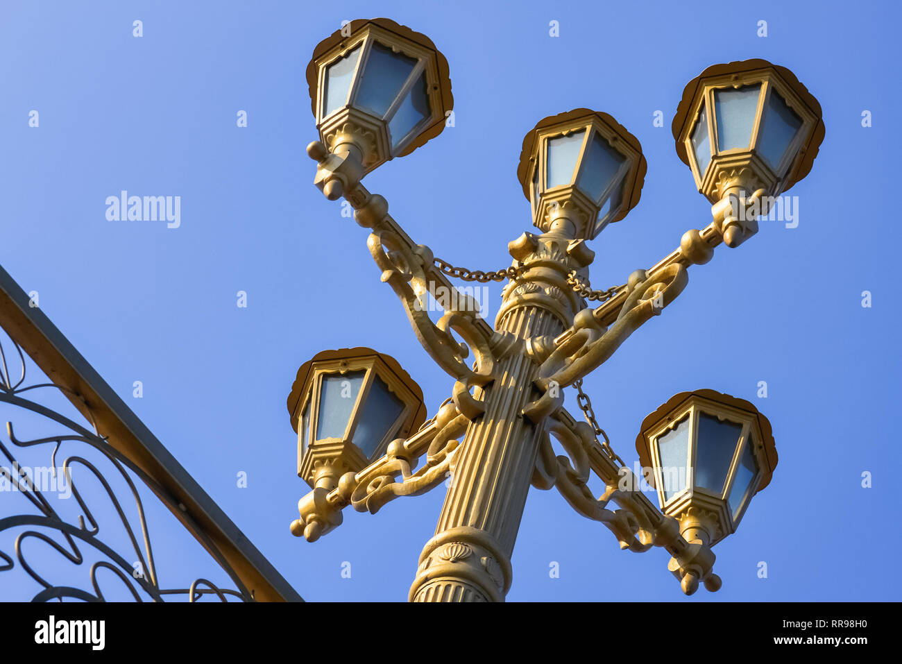 Decorative street light in retro style painted in gold color Stock ...