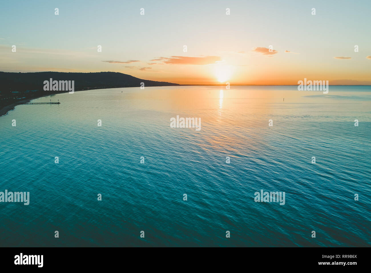 Aerial view of scenic sunset over ocean coastline Stock Photo - Alamy