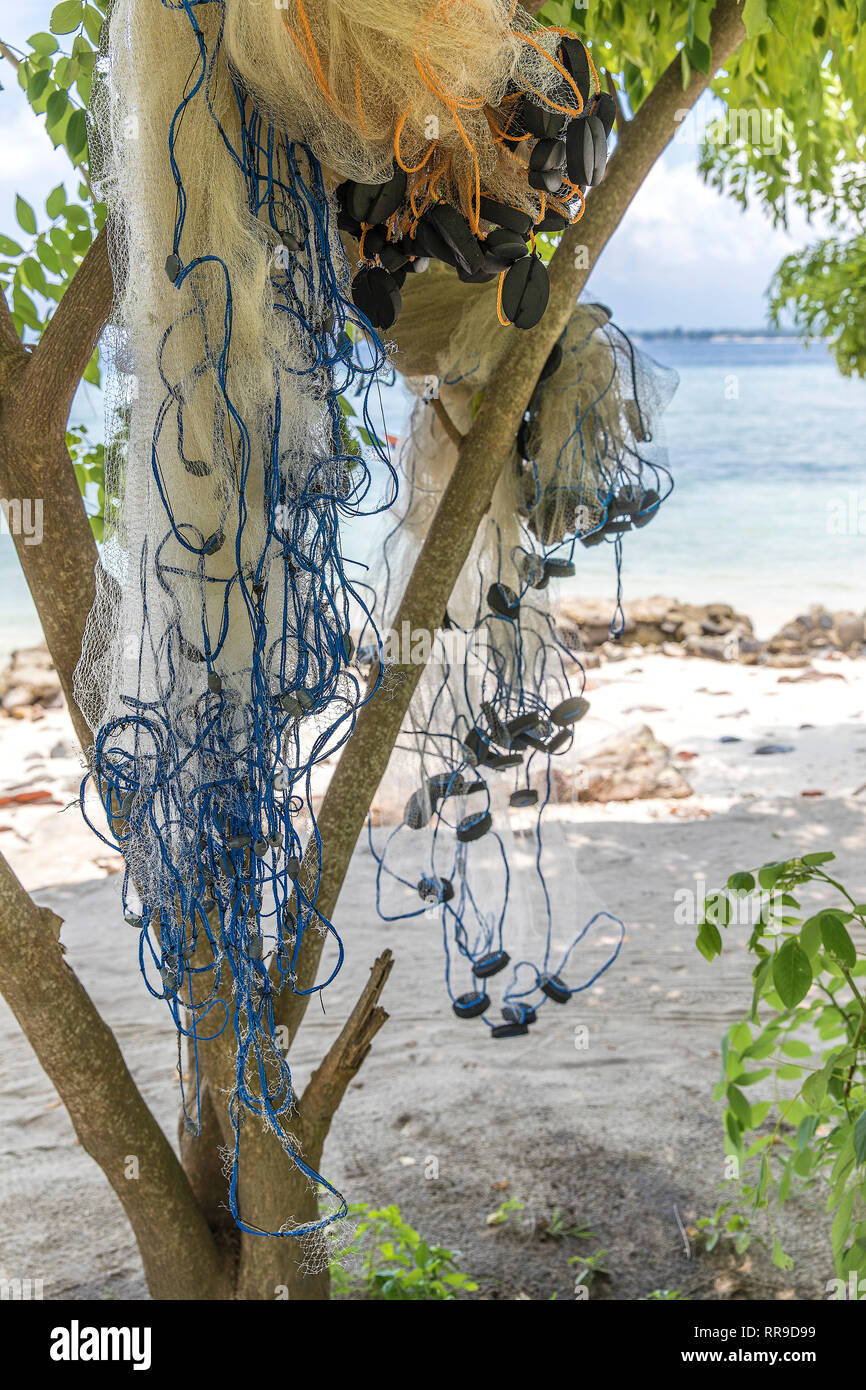 Fishing nets on the beach, gili meno island, Indonesia Stock Photo - Alamy