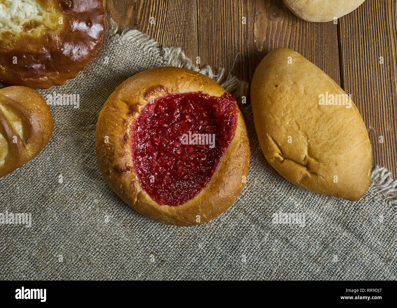 Vatrushka, Russian traditional pies with raspberry jam , assorted ...