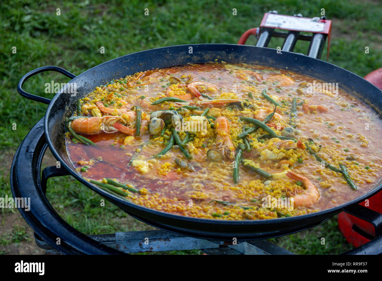 Cooking delicious paella outdoors hi-res stock photography and images ...