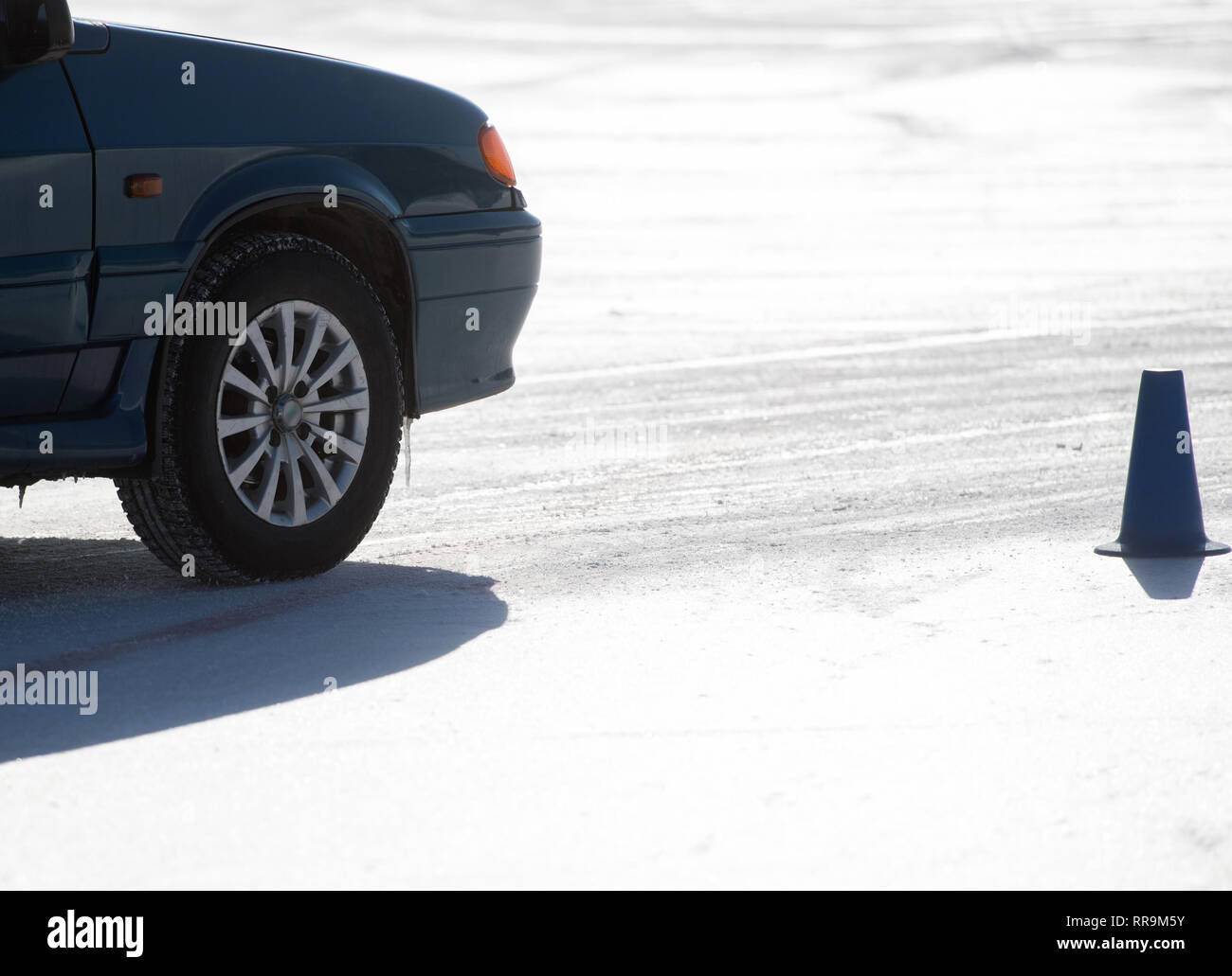 auto racing on ice close up, Winter tyres in extreme cold temperature ...