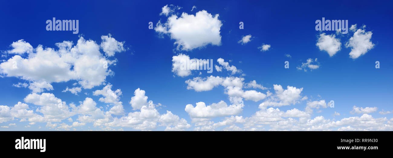 Cloudscape - Blue clear sky and white clouds, wide panorama Stock Photo ...