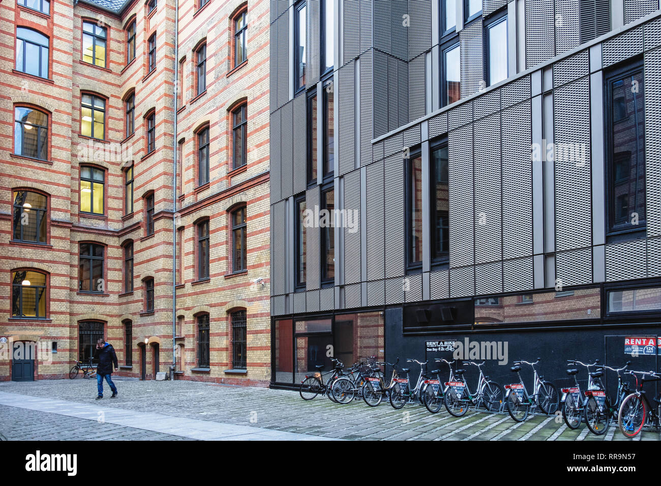 Mitte-Berlin. Inner Courtyard with old brick building facade and modern ...