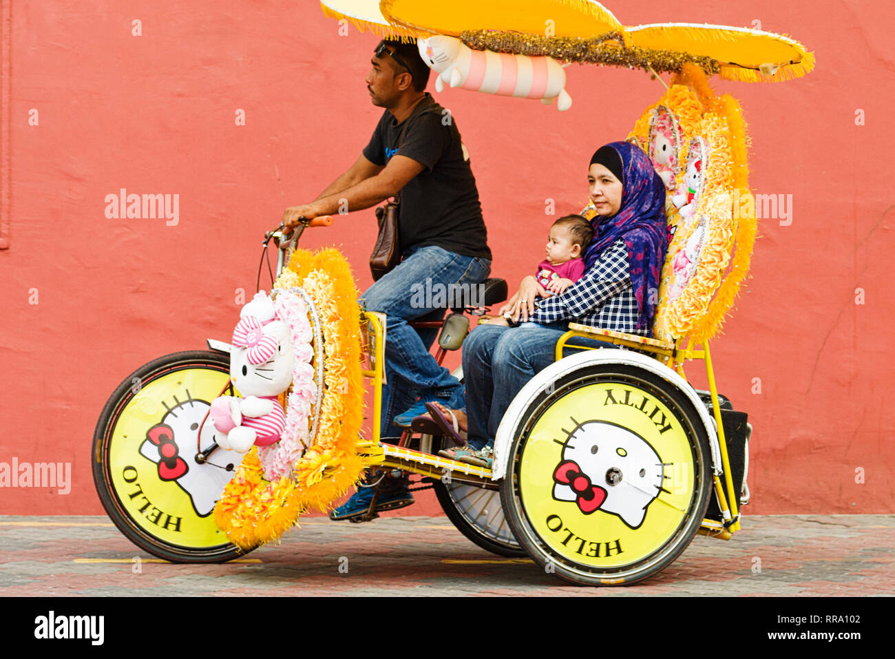 the colorful trishaws, a form of bicycle-powered rickshaw, that cruise ...