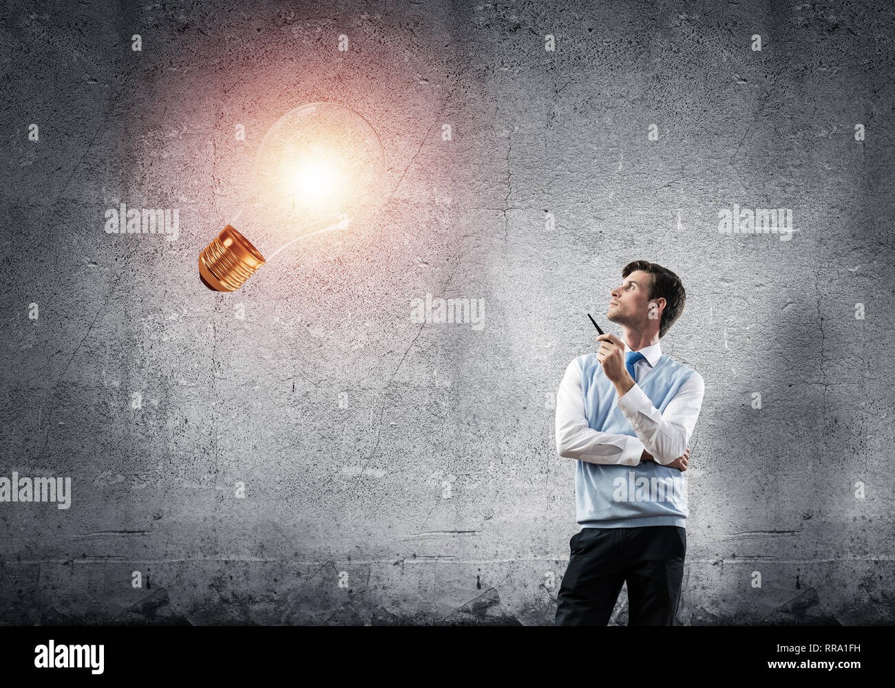 Elegant banker wearing red tie and bulb as idea concept Stock Photo - Alamy