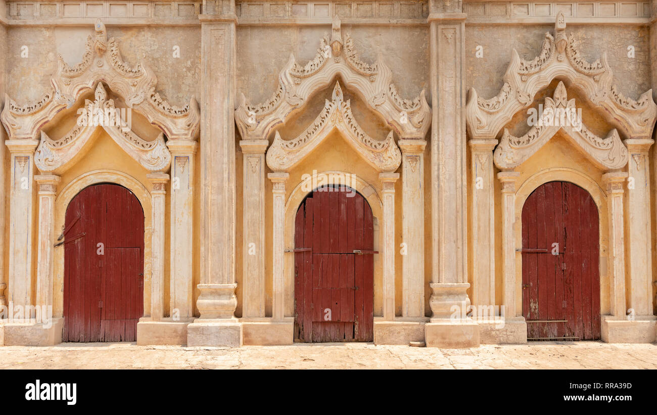 Three red doors in a row at a temple, Bagan, Myanmar Stock Photo - Alamy