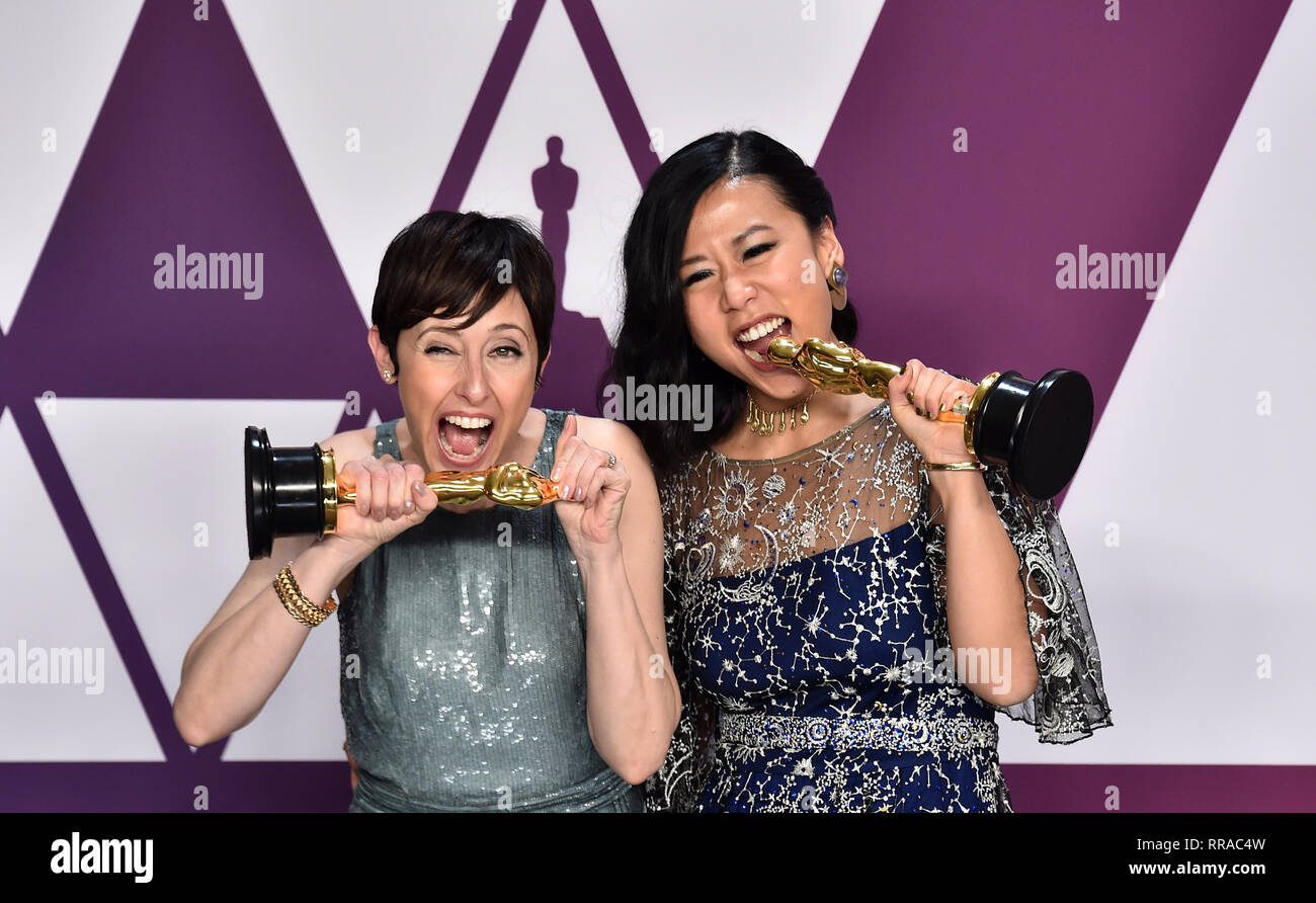 Becky Neiman-Cobb (left) and Domee She with the award for best short ...