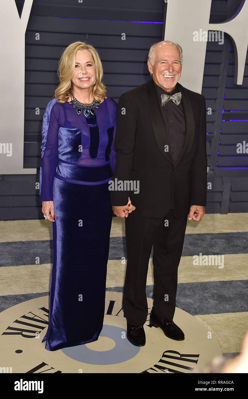 BEVERLY HILLS, CA - FEBRUARY 24: Jane Slagsvol and Jimmy Buffett attend ...