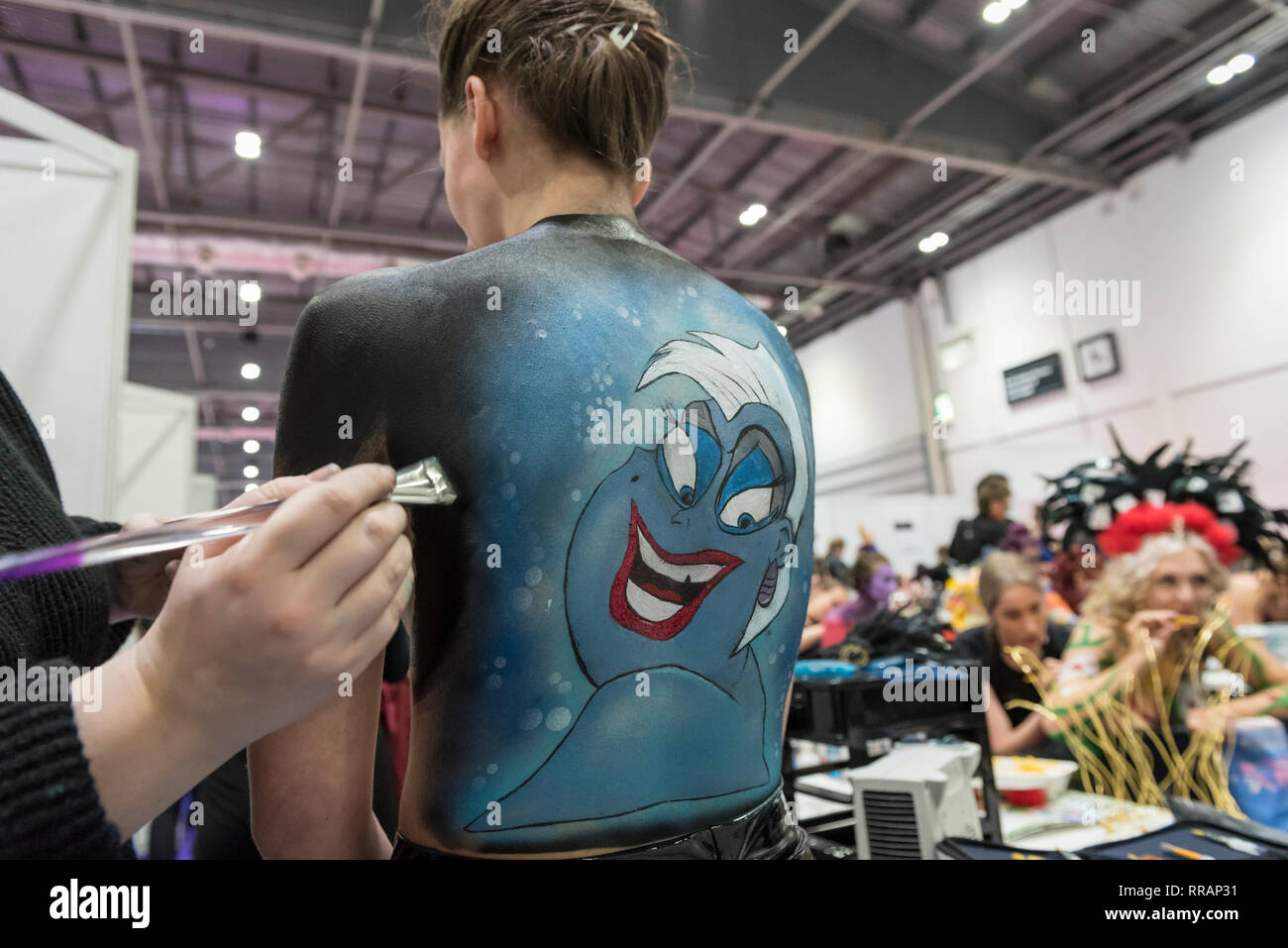 London, UK. 25 February 2019. Models covered in bodypaint with a Disney ...