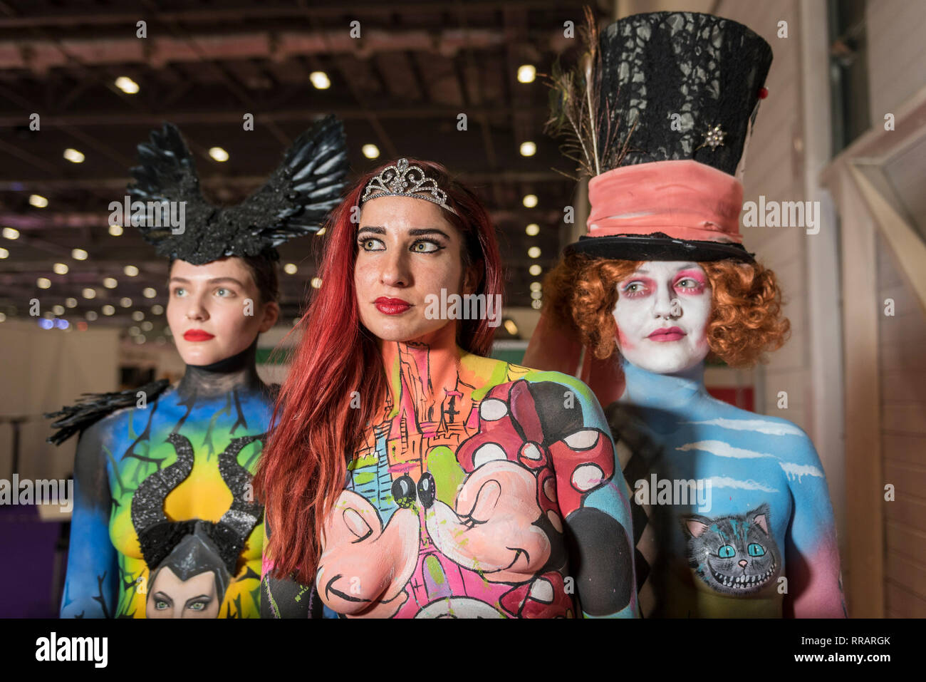 London, UK. 25 February 2019. Models covered in bodypaint with a Disney ...