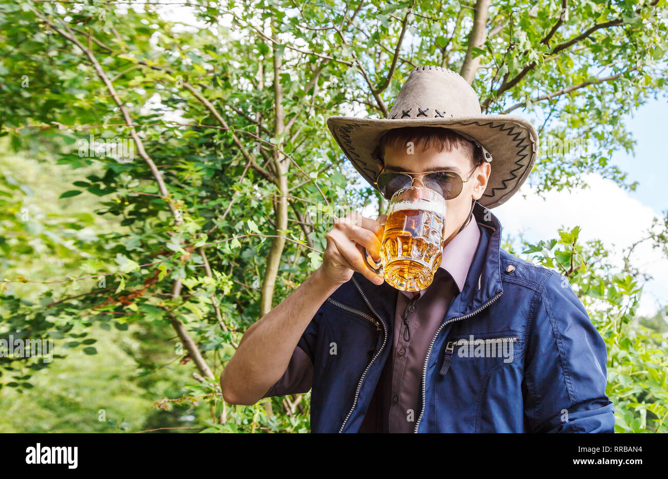 Cowboy Drinking Beer High Resolution Stock Photography and Images - Alamy