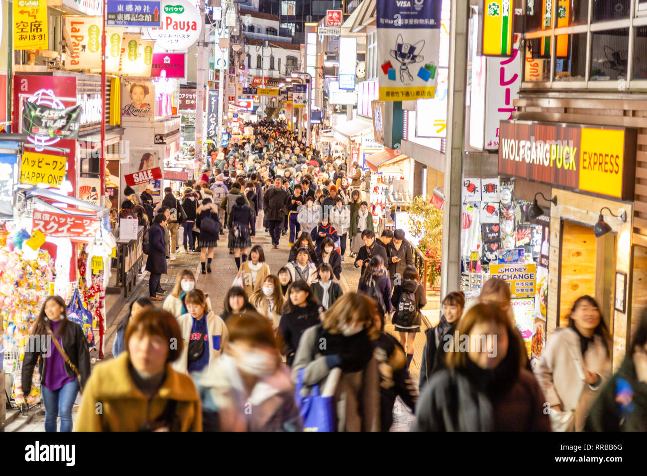 TOKYO, JAPAN - FEBRUARY 1, 2019: Unidentified people walk along ...