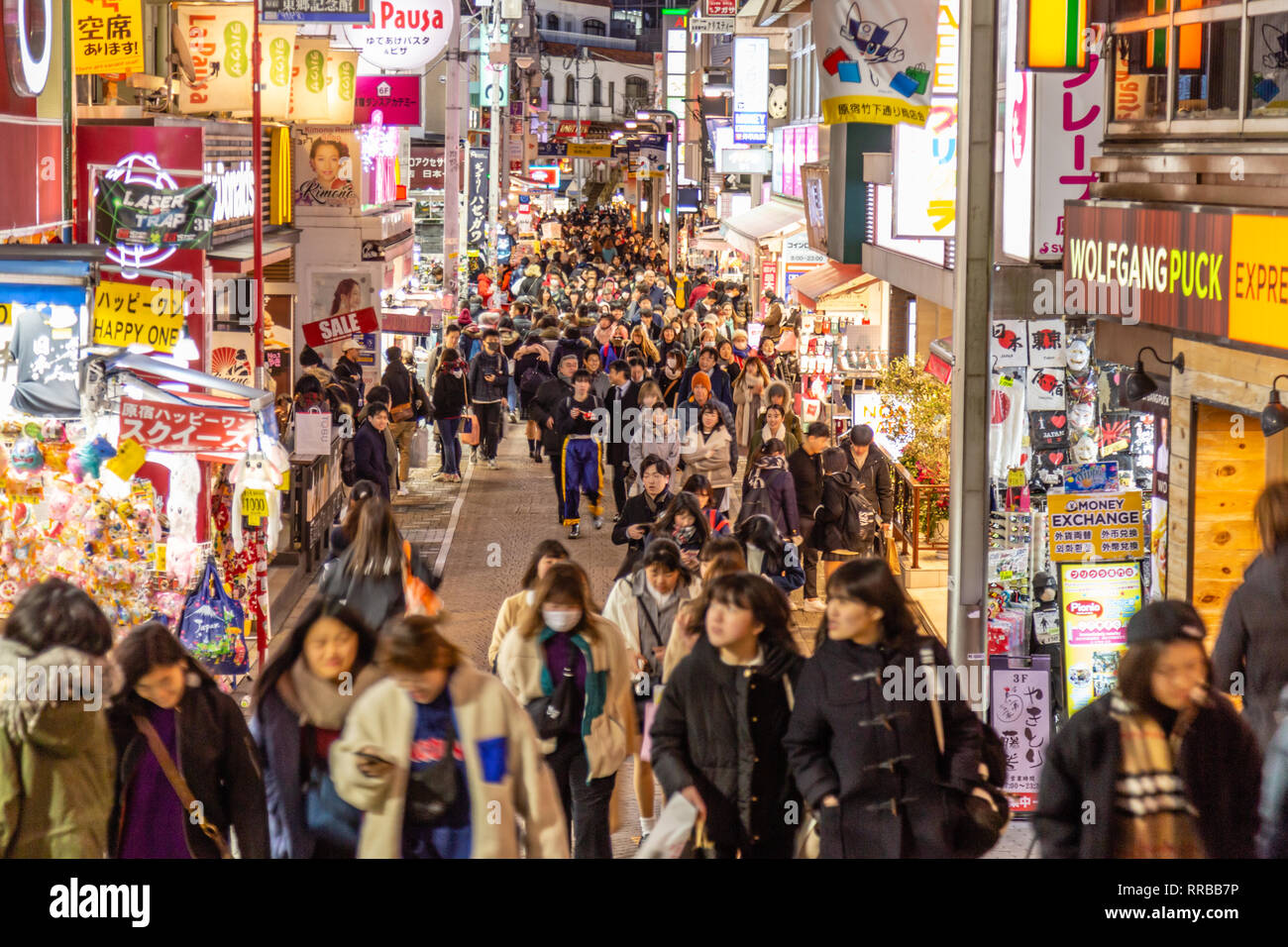 TOKYO, JAPAN - FEBRUARY 1, 2019: Unidentified people walk along ...