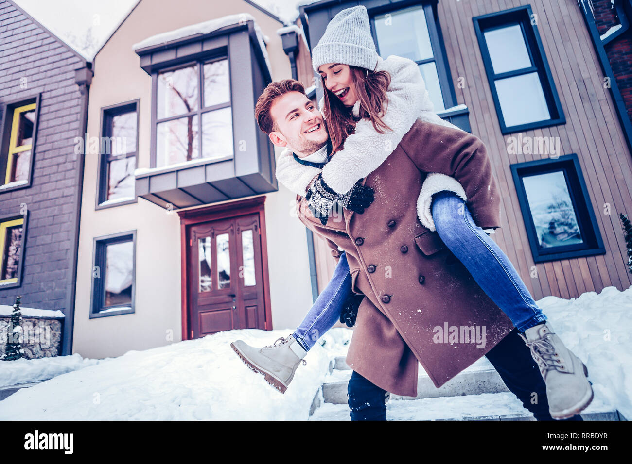 Couple feeling truly positive while having much fun outside Stock Photo ...