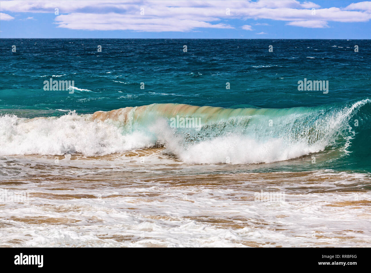 Breaking ocean wave and sand from the ocean floor Stock Photo - Alamy