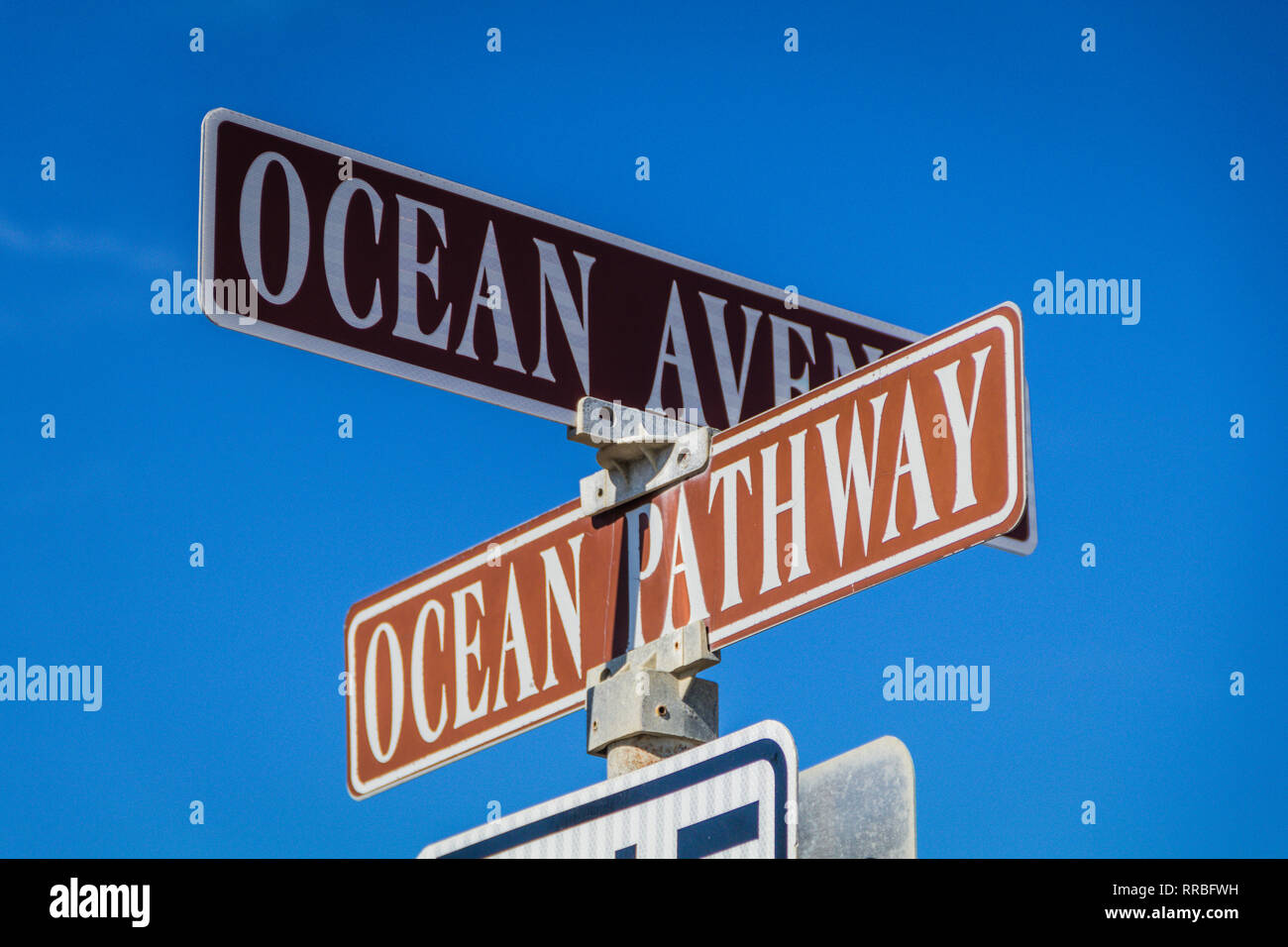 Ocean Avenue and Ocean Pathway signs in Ocean Grove, NJ, on a sunny ...