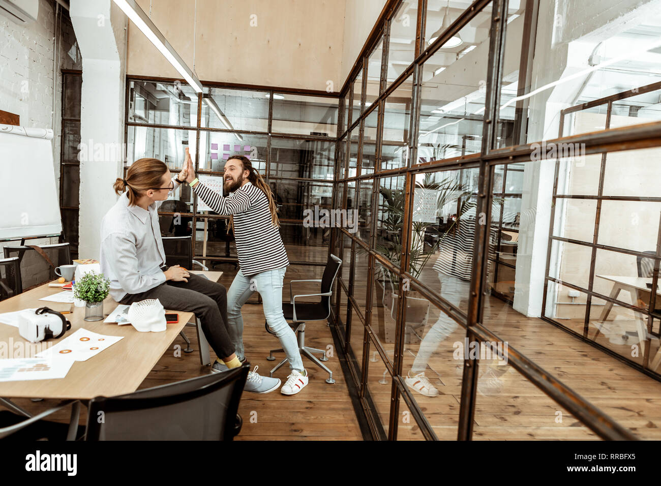 Digital high five hi-res stock photography and images - Alamy