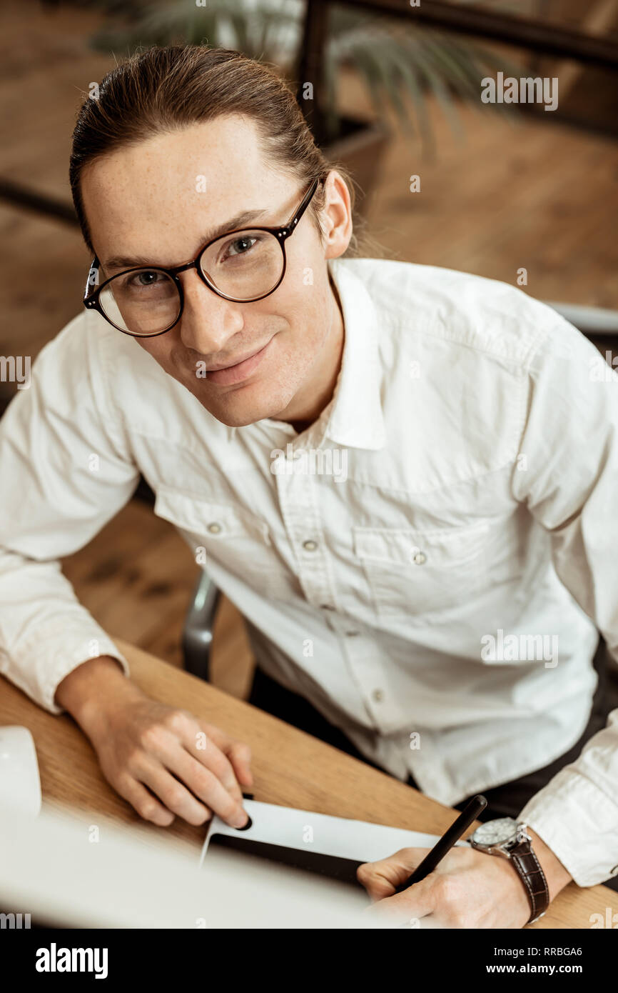 Top view of a nice hard working man Stock Photo - Alamy