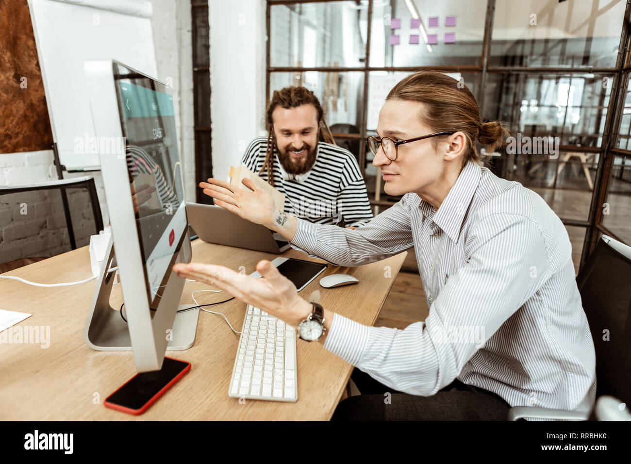 Sad unhappy man looking at the computer screen Stock Photo - Alamy