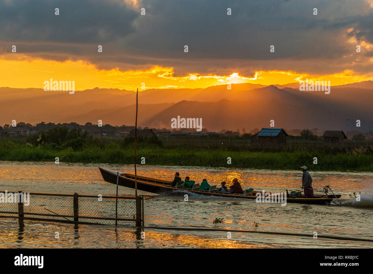 Water spitting canoe whizzing on water Stock Photo - Alamy