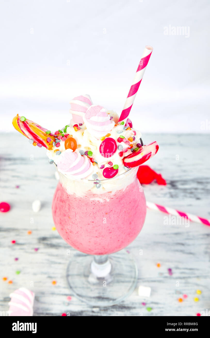 Pink Extreme milkshake with berry, rasberry, strawberry, candy ...
