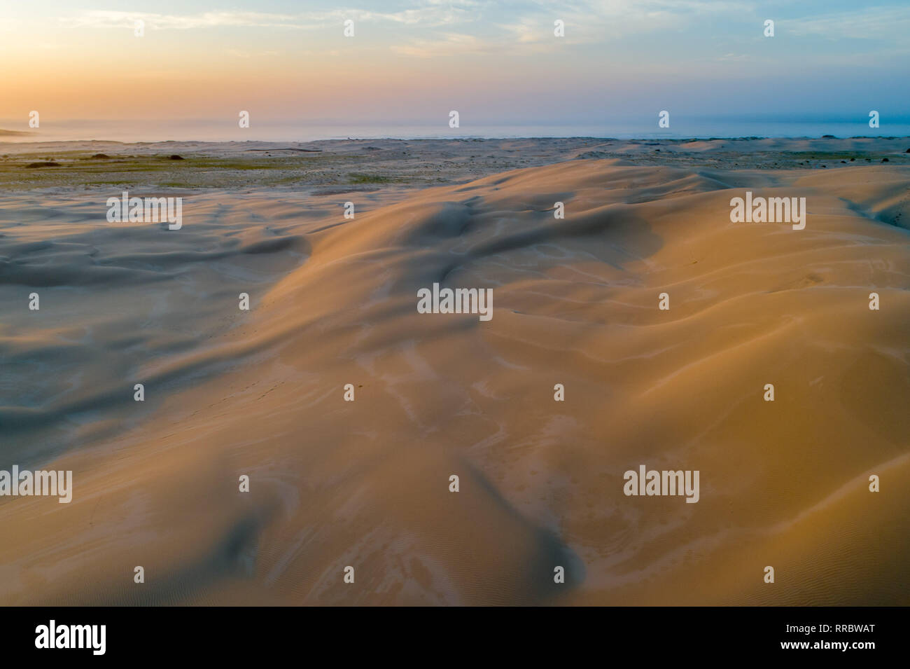Scenic sand dunes near the ocean at sunrise. Anna Bay, New South Wales ...